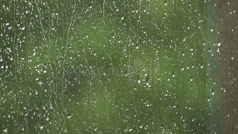 Rain Drops Running Down the Window Surface. Heavy Summer Rain Outside ...