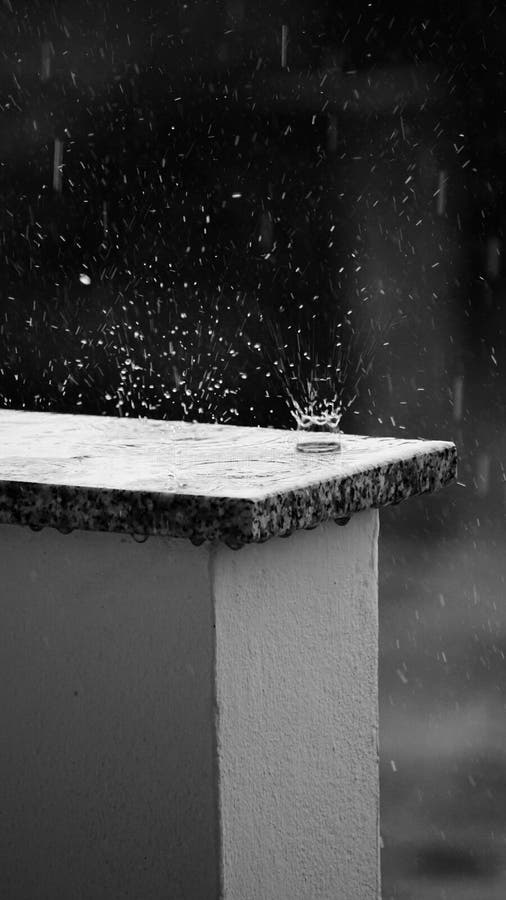 Rain drops on a stone wall stock image. Image of liquid - 258904083