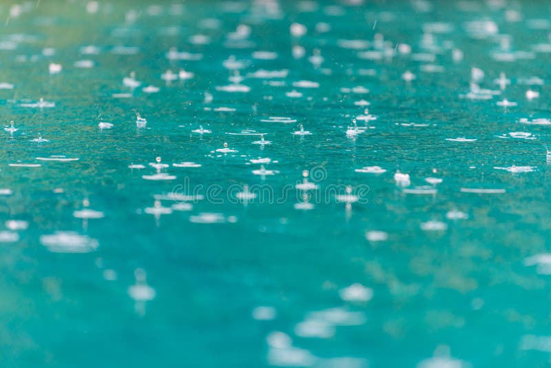 Rain Drops on the Surface of the Pool. Stock Photo - Image of travel ...