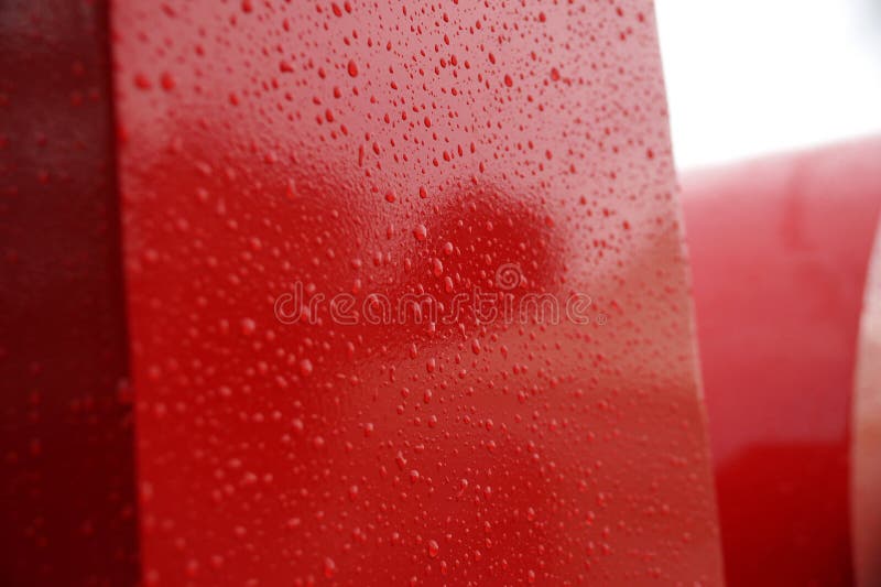 Rain Drops on a Surface of Red Color Stock Photo - Image of color ...
