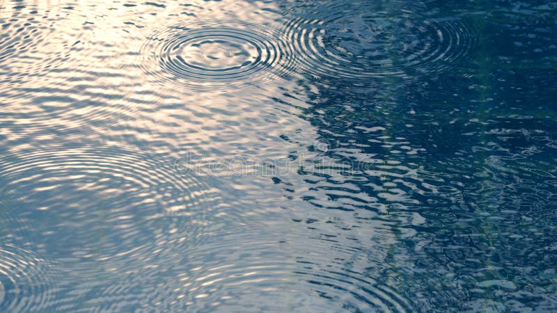 Rain Drops on the Swimming Pool. Stock Image - Image of aqua, cool ...