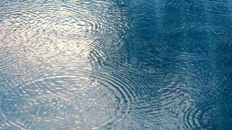 Rain Drops on the Swimming Pool. Stock Image - Image of splash ...