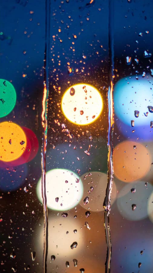 Rain Drops on Window with Bokeh City Lights at Night Abstract ...