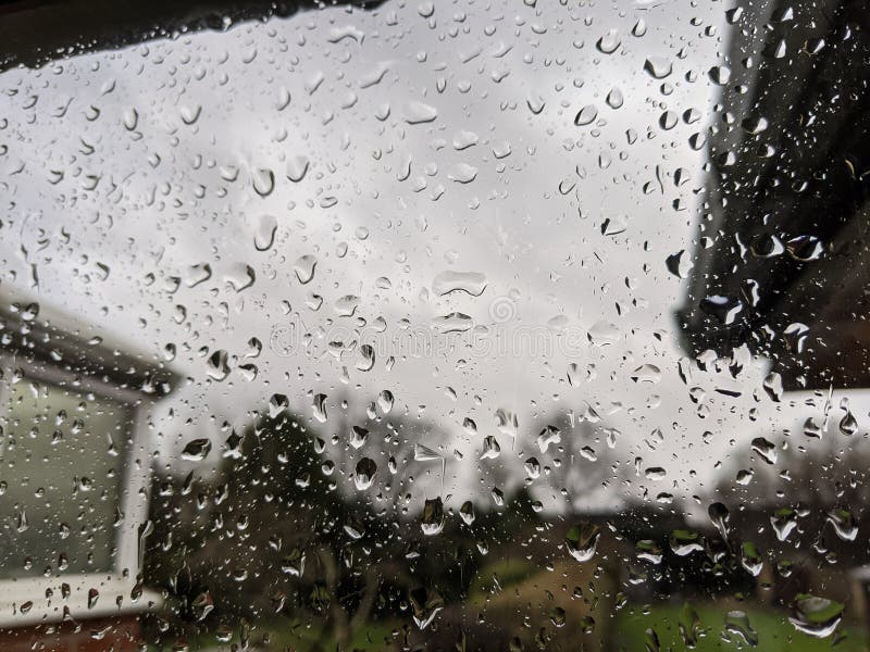 Rain drops on a window stock image. Image of winter - 171899169