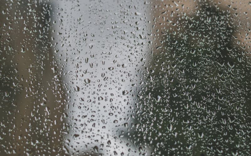 Rain Drops on the Window Glass. Autumn and Fall Concept. Stock Photo ...