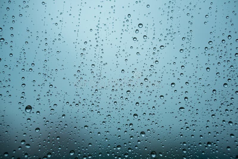 Rain Drops on Window Glass on Blue Color Stock Photo - Image of surface ...