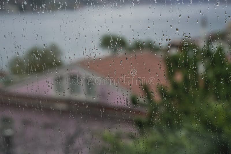 Rain drops on window pane stock photo. Image of drops - 97288736