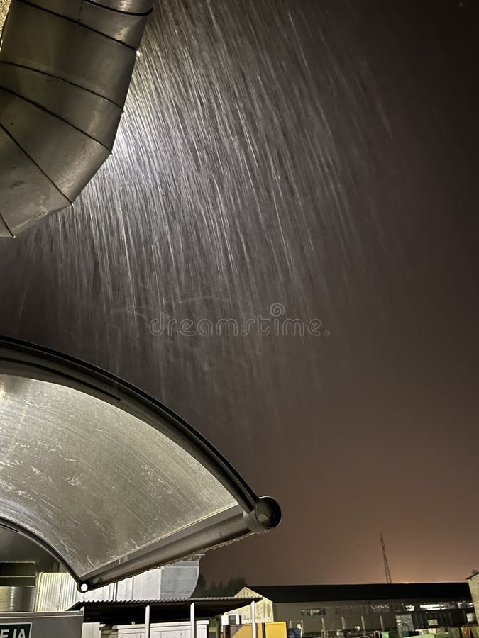 Rain at factory territory stock photo. Image of light - 254920068