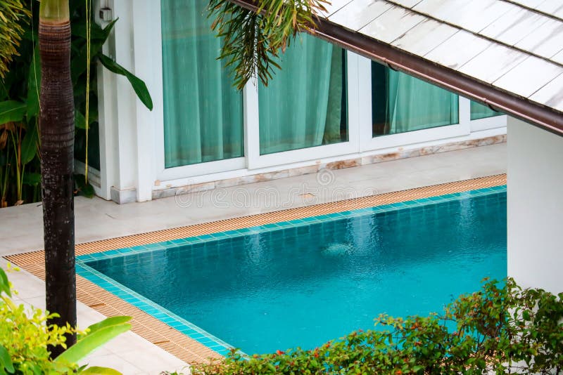 Rain Fall on Swimming Pool Middle Garden in Villa Stock Image - Image ...