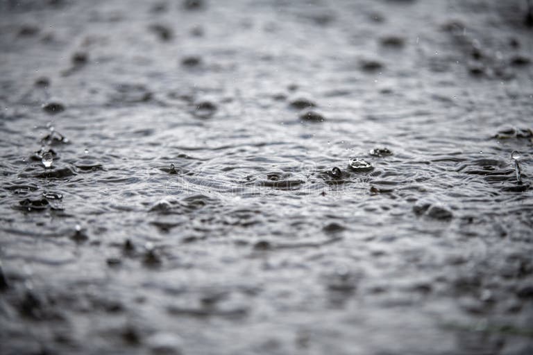Rain Falling Raindrops. Water Background. Water Surface. Water Surface ...