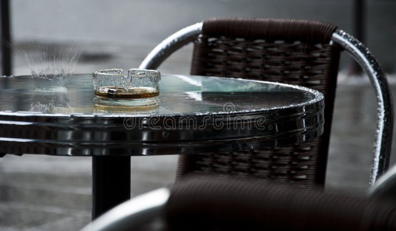 Rain Falling on a Restaurant Table in Outdoor Stock Image - Image of ...