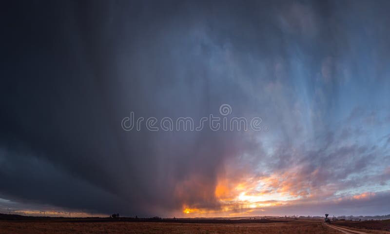 Rain Falling from the Sky in the Evening Light Stock Photo - Image of ...