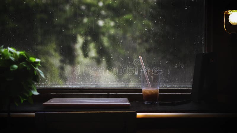 Rain And Raindrops Falling On The Window Comfortable Relaxation And