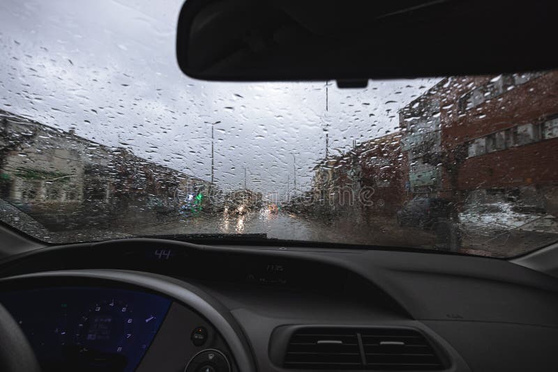 Rain Falling on a Windscreen while Driving on a Highway Road without ...