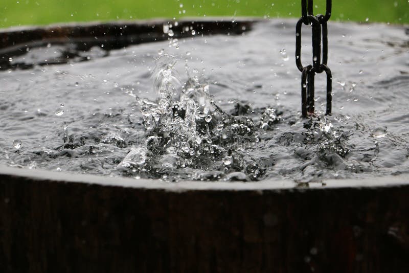 Rain is Falling in a Wooden Barrel Full of Water in the Garden Stock ...