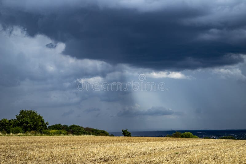 Rain Falls in Streaks from a Cloud in Countryside Area, Field in the ...