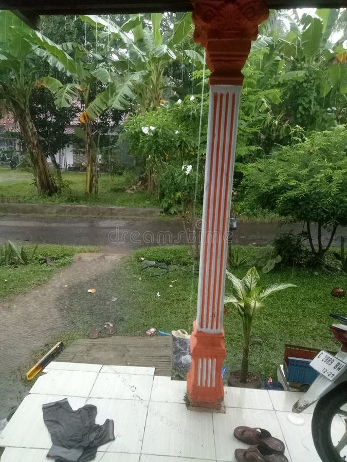 Rain in front of the house editorial stock image. Image of front ...