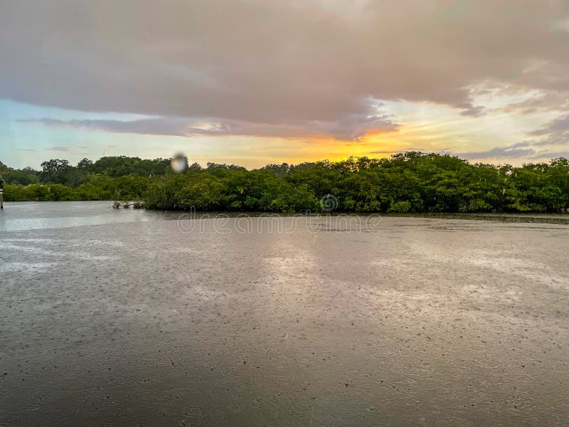 Rain Gently Falling on a River during Sunset Stock Image - Image of ...