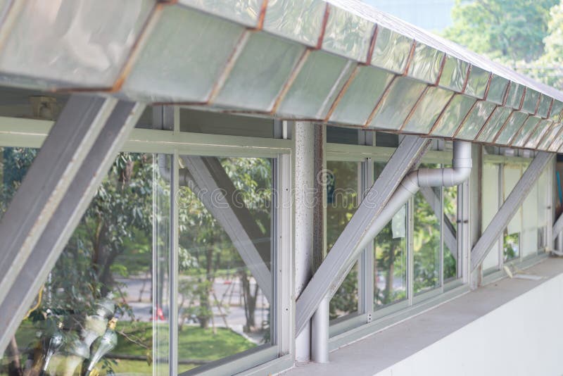 Rain Gutter with Down Pipe on Rooftop of Building Stock Photo - Image ...