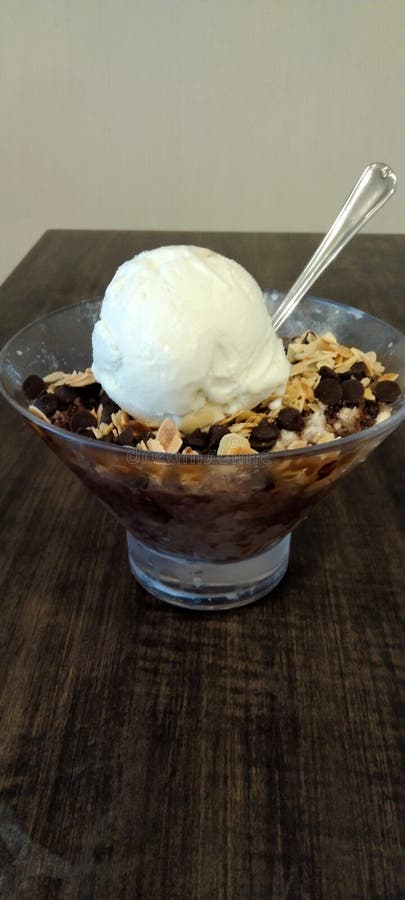 Rain Ice Cream with Mixed Nuts and Raisin Stock Photo - Image of cream ...