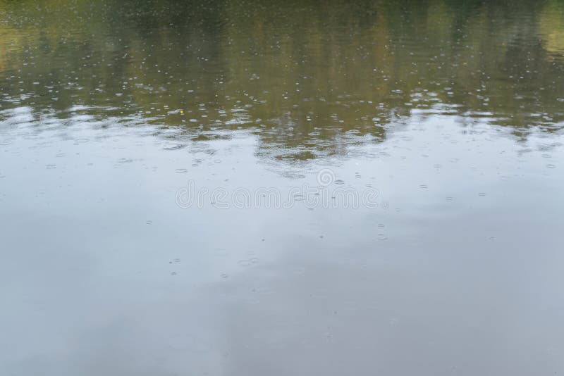 Rain on Lake, Raindrops on Water Surface Outdoors. Cloudy Cold Weather ...