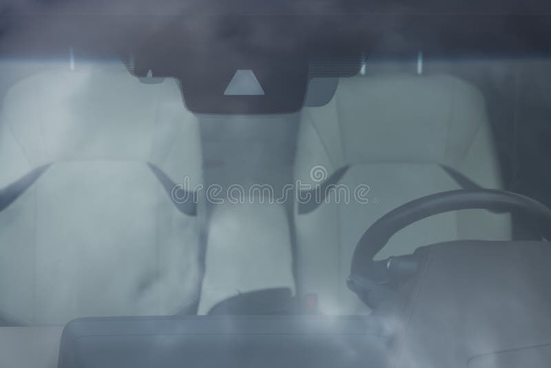 Rain and Light Sensor on the Windshield of the Car. Close Up View of ...