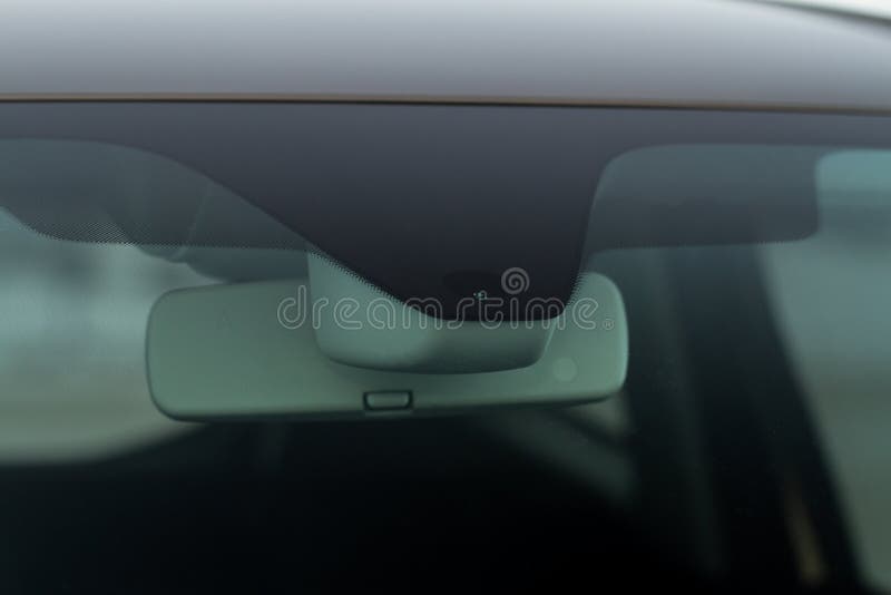 Rain and Light Sensor on the Windshield of the Car. Stock Image - Image ...