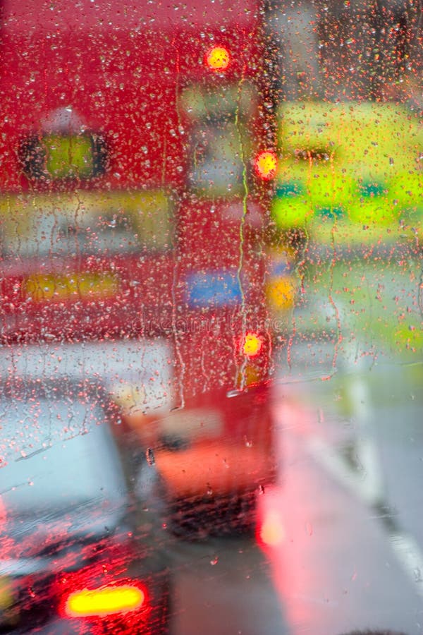 London Rain View To Red Bus through Rain-specked Window Stock Image ...
