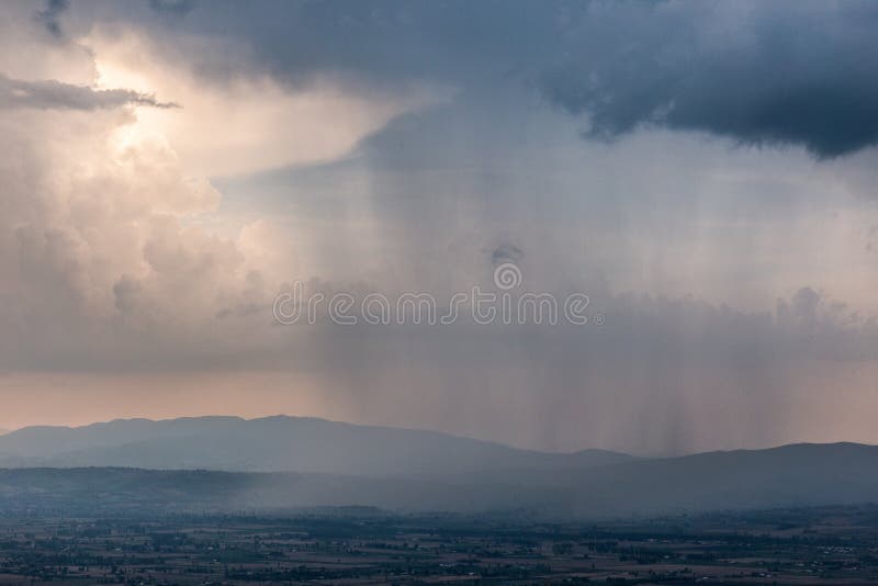 Rain and Mist between Valley and Layers of Mountains and Hills Beneath ...