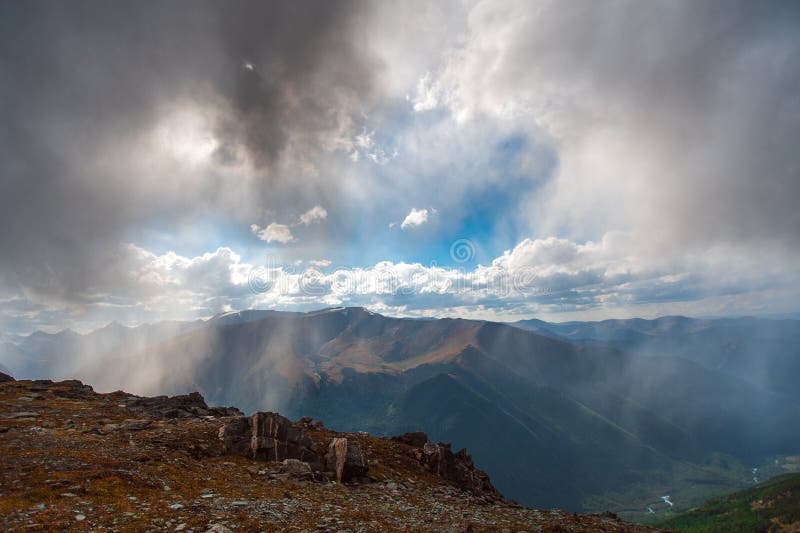 Rain in the Mountains with a Gleam of Blue Sky Stock Image - Image of ...