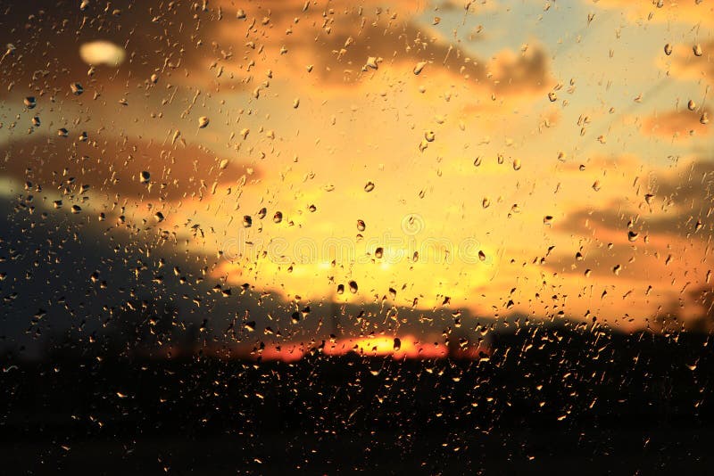 Rain Outside Window on Sunset Background. Water Drops on Glass during ...