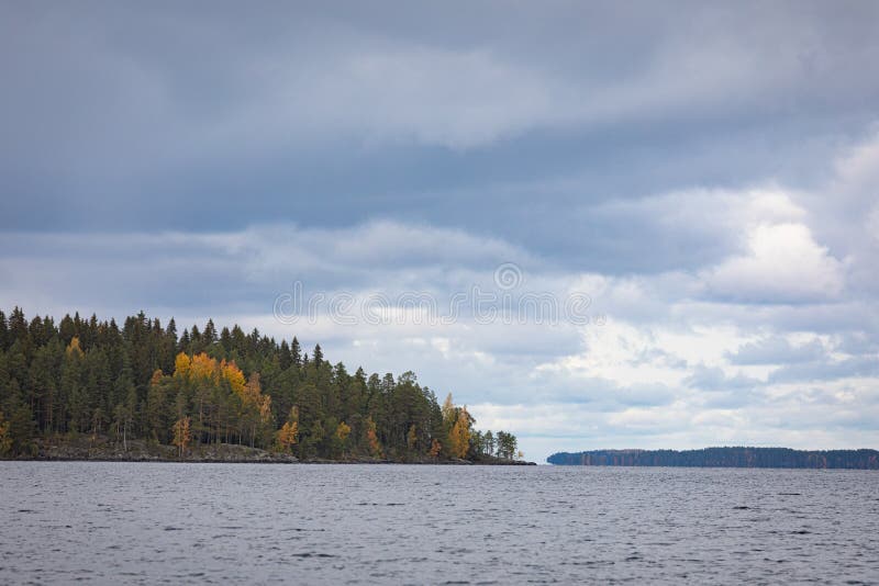Rain Over Autumn Colors Forest at Lake Shore Stock Photo - Image of ...