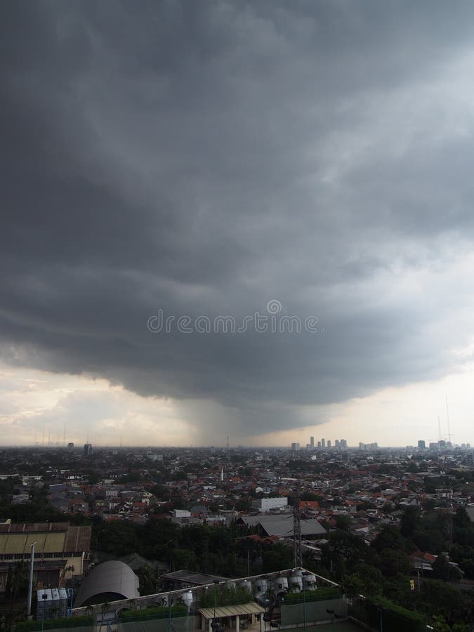 Rain over Jakarta stock photo. Image of thunder, daytime - 51812252