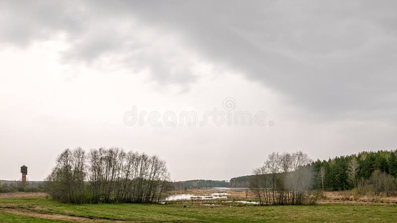Rain over the lake stock image. Image of dark, rainy - 97686097