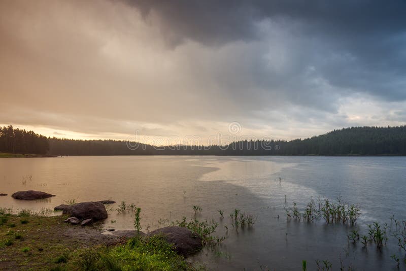 Rain Over the Lake at Sunset Stock Image - Image of cloudscape ...