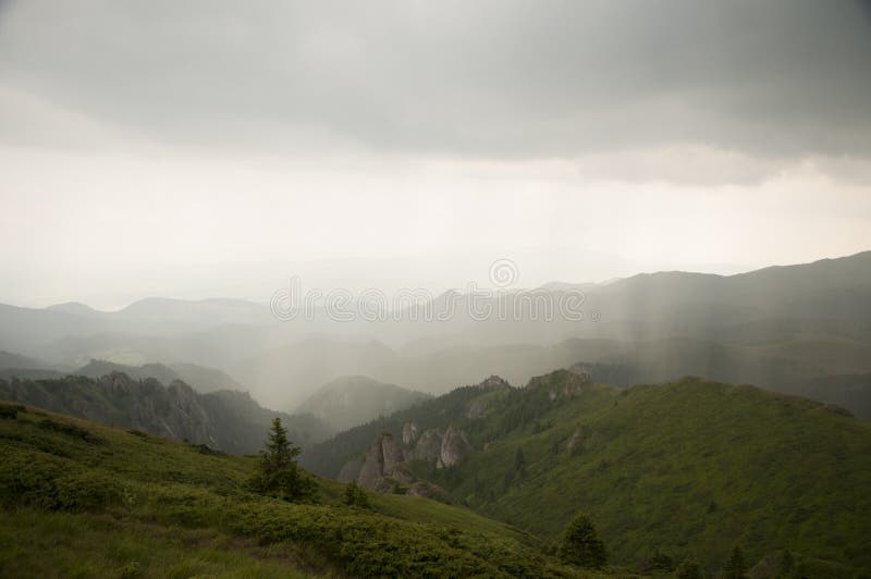 Rain over mountains stock photo. Image of dark, nature - 56852830
