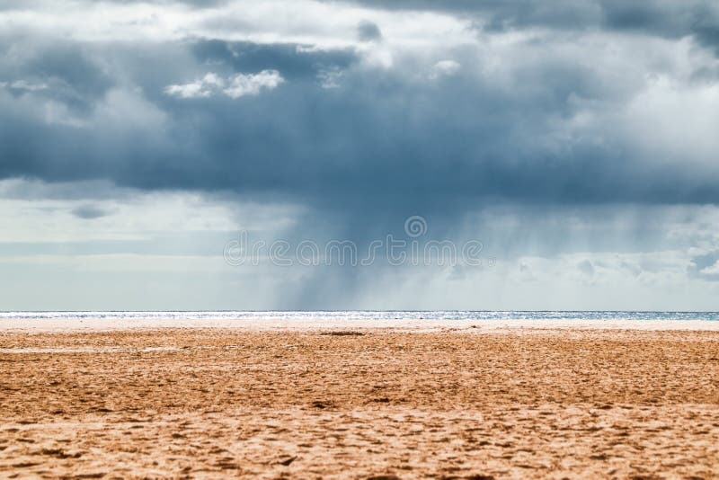 Rain Over Ocean with Sunny Beach Stock Image - Image of scene ...