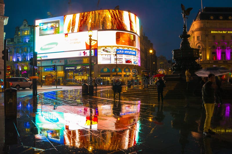 Rain in piccadilly circus editorial photography. Image of monument ...