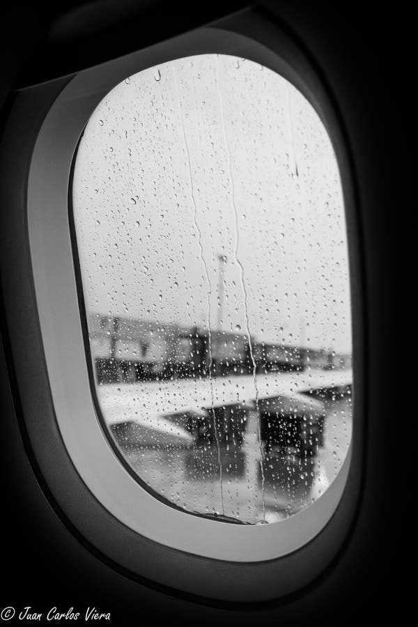 Rain on the plane window stock image. Image of black - 199964107