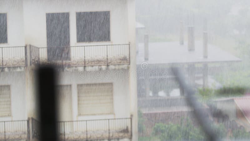 Rain Pouring Down a Small Town Stock Footage - Video of raindrop ...