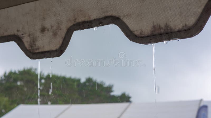 Rain in Pouring Over Marquee Stock Photo - Image of hill, moisture ...