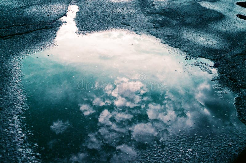 Rain puddle stock image. Image of road, damaged, pothole - 72673965