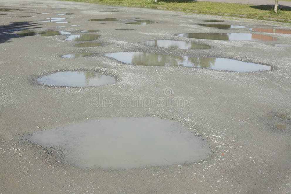 Rain puddles stock image. Image of puddles, rain, europe - 98378991