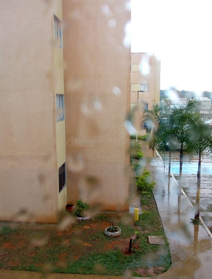 Rain through stock photo. Image of rain, geometric, building - 129277404