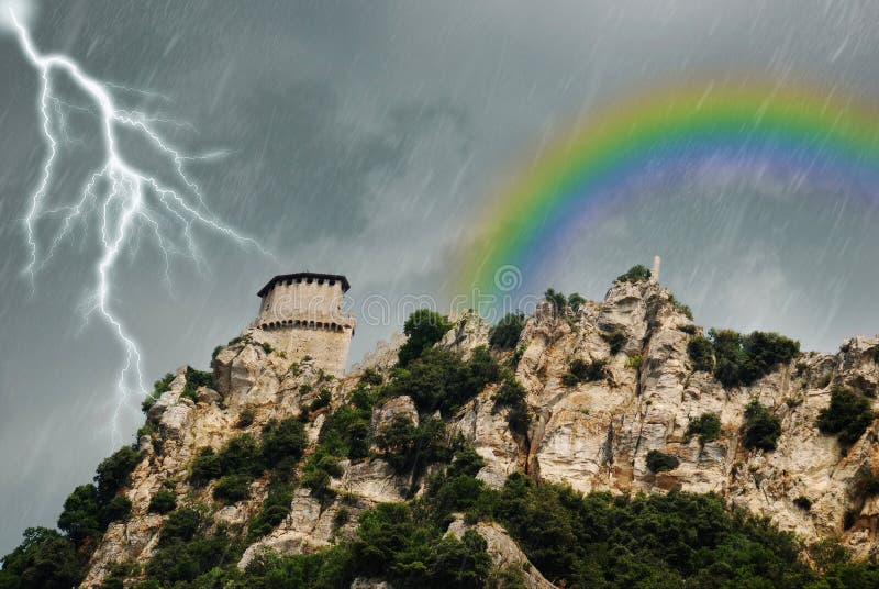 Rainbow and Lightning Over the Rock Stock Photo - Image of rock ...