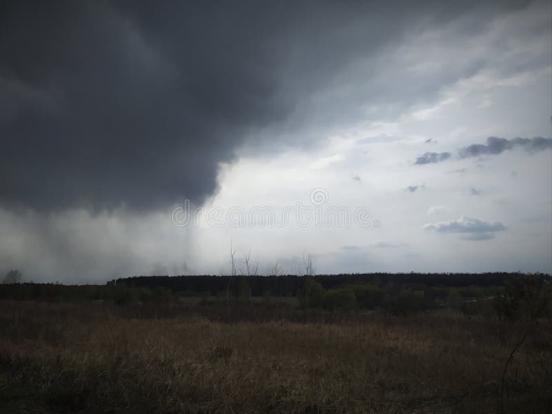 During the Rain in the Sky Above the Field Stock Photo - Image of ...