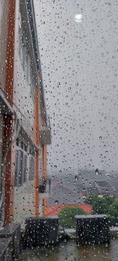 Rain splashes on the glass stock image. Image of rain - 262792801