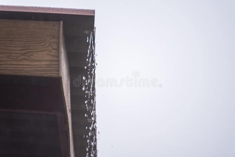 Rain Storm with Metal Sheet Roof,rainwater Flows Down the Roof Stock ...