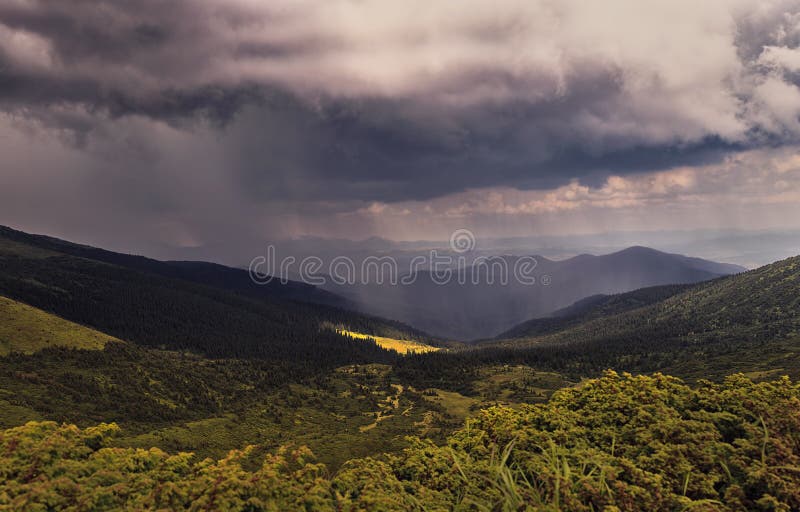 Rain and Sun in the Mountains. Panorama. Stock Image - Image of ...