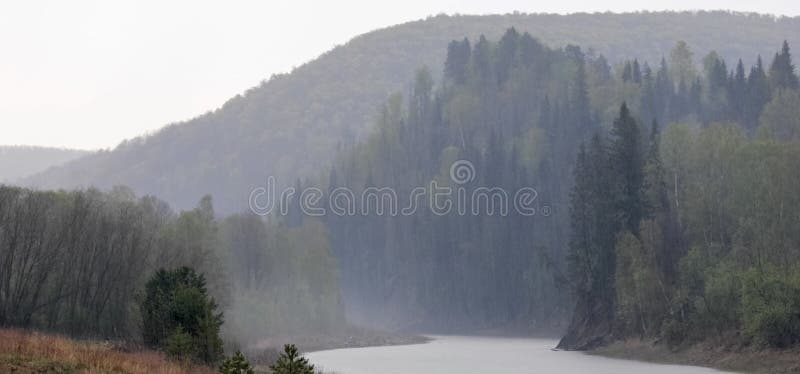 Rain in the Taiga Over the River. Cloudy Weather in Forest. Stock Image ...